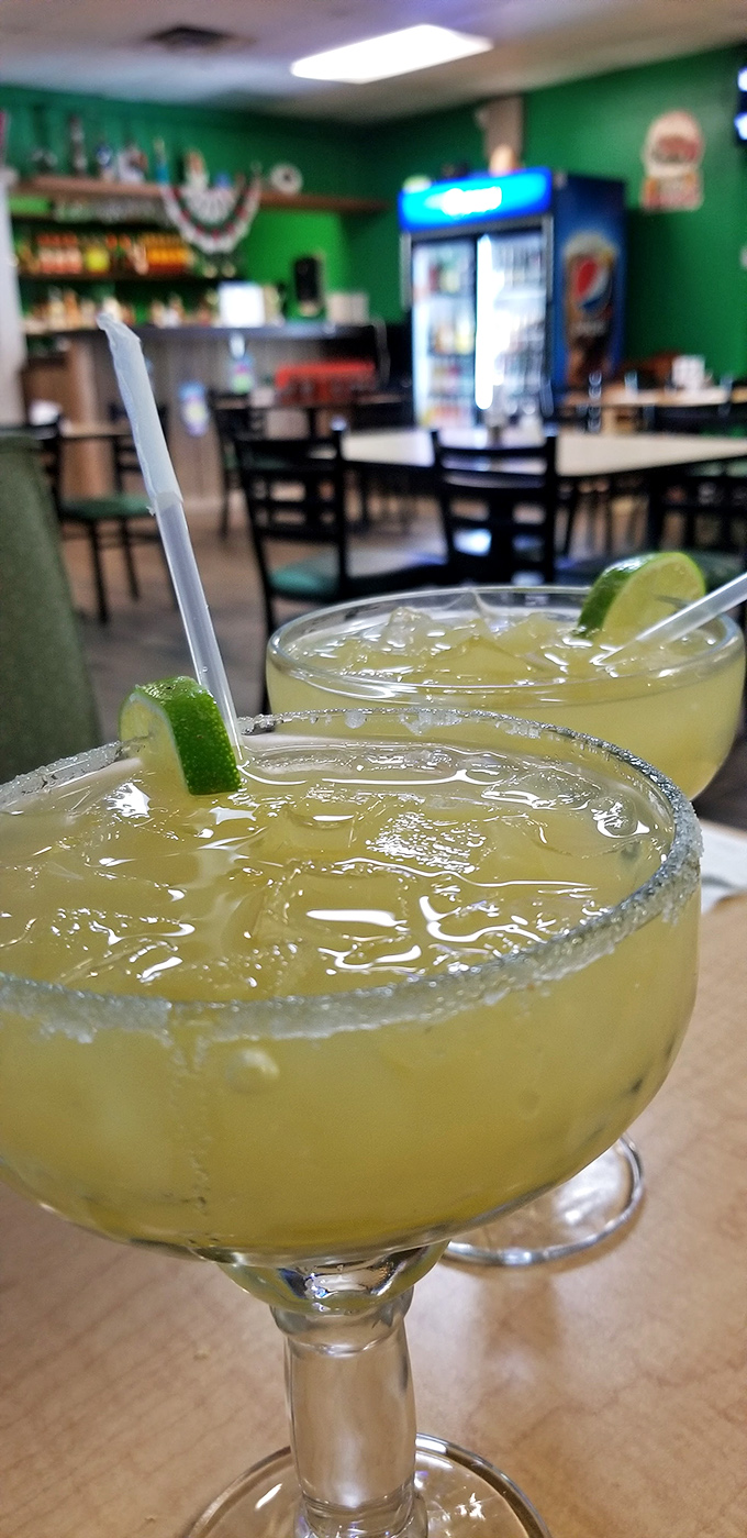 Margaritas with salt-rimmed glasses that say "vacation" even if you're just on lunch break. The lime garnish isn't optional&mdash;it's essential.