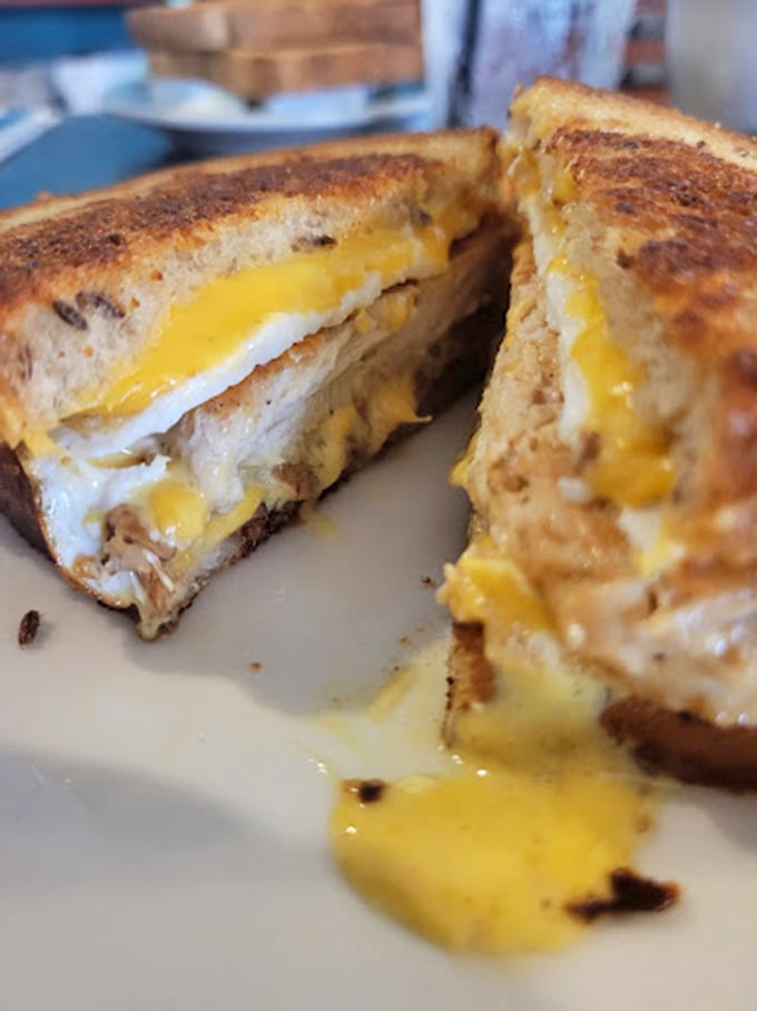 The humble grilled cheese&mdash;elevated to art form with perfectly melted American cheese oozing between golden-brown bread. Comfort on a plate.
