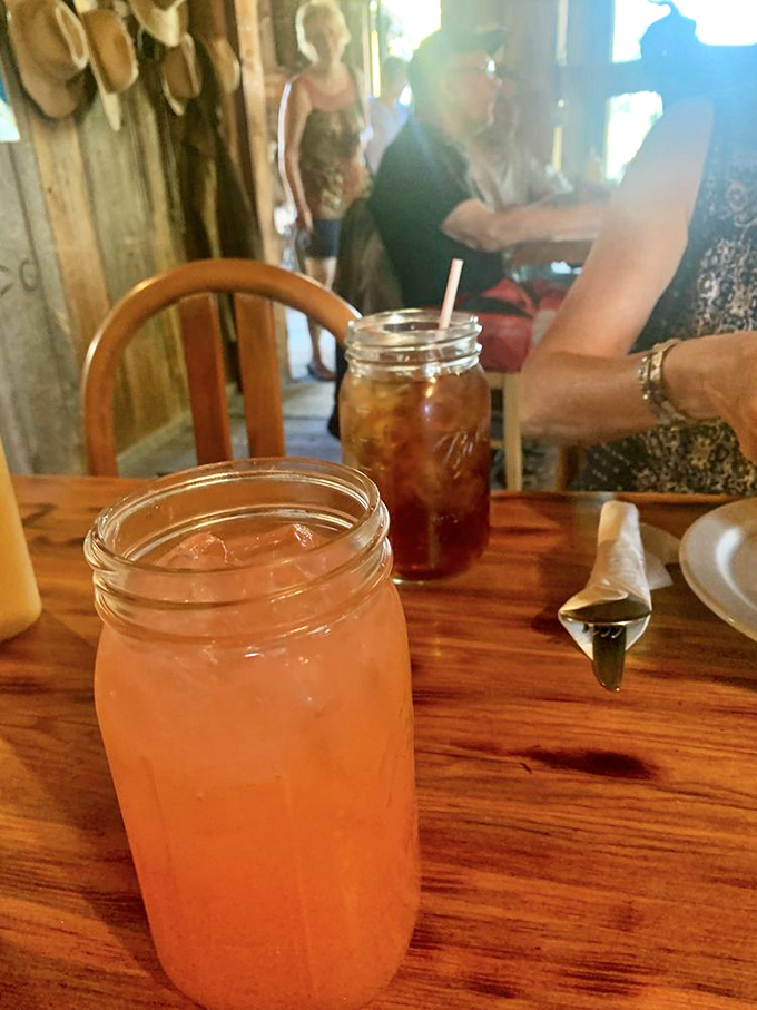 Mason jars filled with sweet pink lemonade and iced tea&mdash;because cowboys don't drink from stemware, and neither should you here.