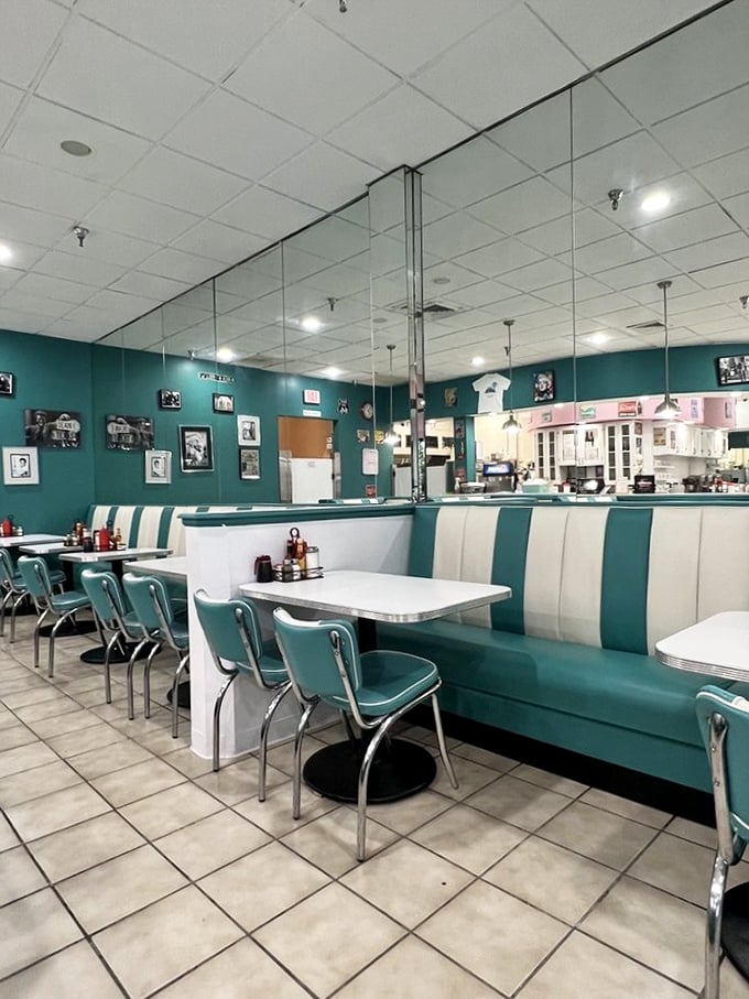 Diner design perfected: teal chairs, chrome accents, and tile floors that have witnessed countless breakfast epiphanies. This is America's living room.