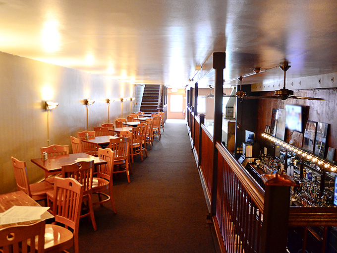 The upstairs dining area offers a bird's-eye view of the bar below&mdash;perfect for oyster enthusiasts who appreciate both food and theater.