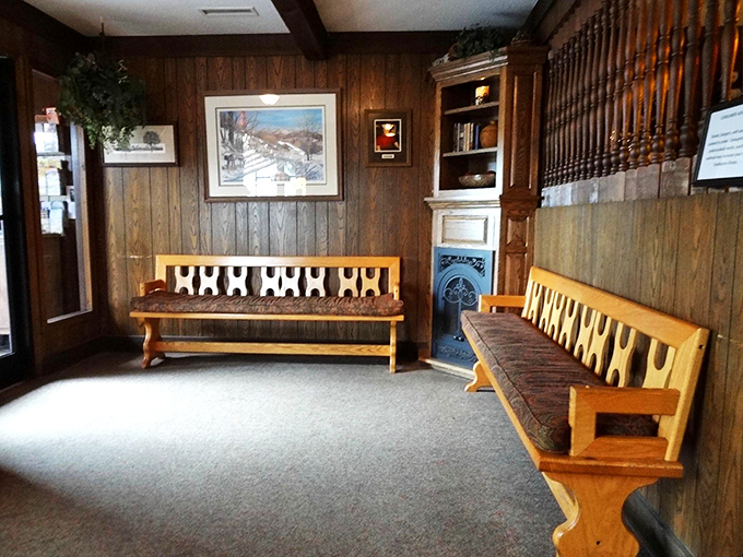 The restaurant's waiting area feels less like a lobby and more like the living room of a beloved mountain lodge you've visited for generations.