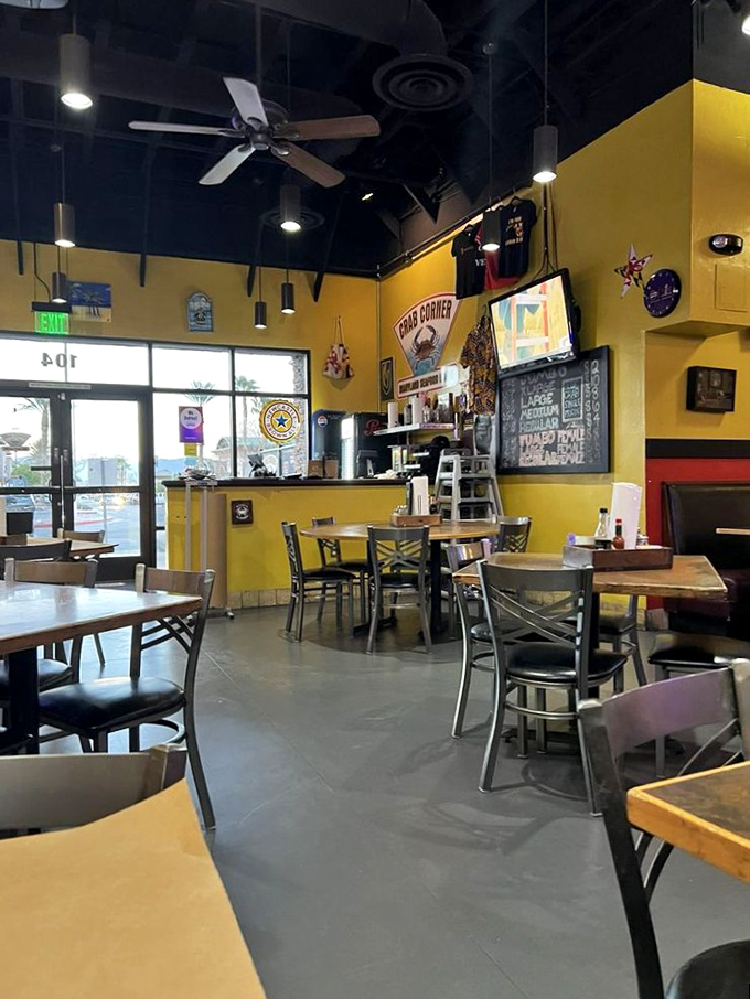 Sunshine yellow walls and casual seating create the perfect backdrop for the seafood drama about to unfold on your table.