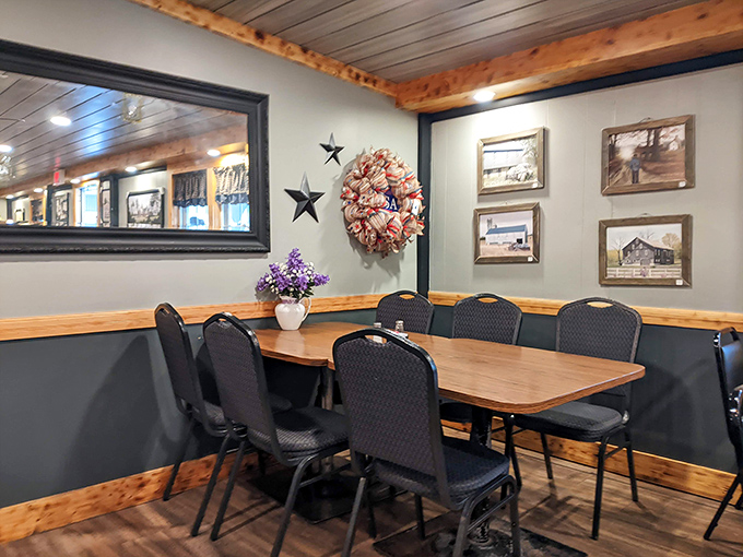 A dining room where memories are made between bites. Those framed photos on the wall aren't decoration&mdash;they're the visual history of a community.