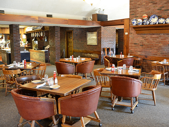 Exposed brick, wooden beams, and decorative plates&mdash;the dining room feels like your favorite aunt's house, if your aunt were a steak savant.