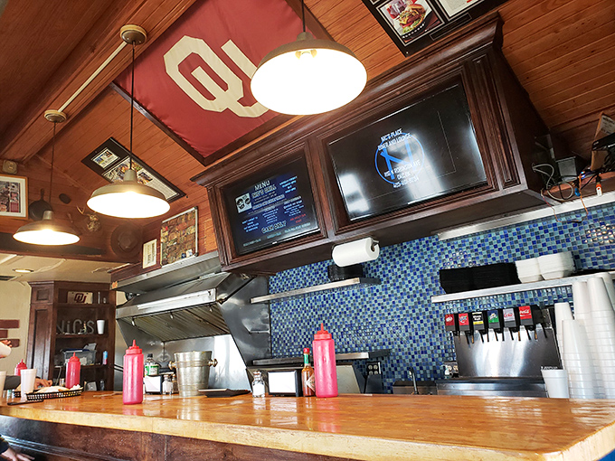 Oklahoma pride hangs from the ceiling while hungry patrons focus on what really matters&mdash;the sizzle from behind the counter.