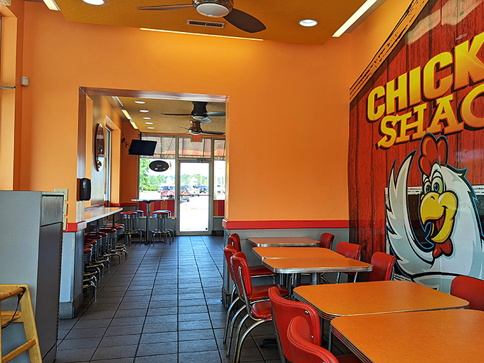 The Chicken Shack's vibrant interior feels like stepping into a diner from a happier timeline where calories don't count and flavor reigns supreme.