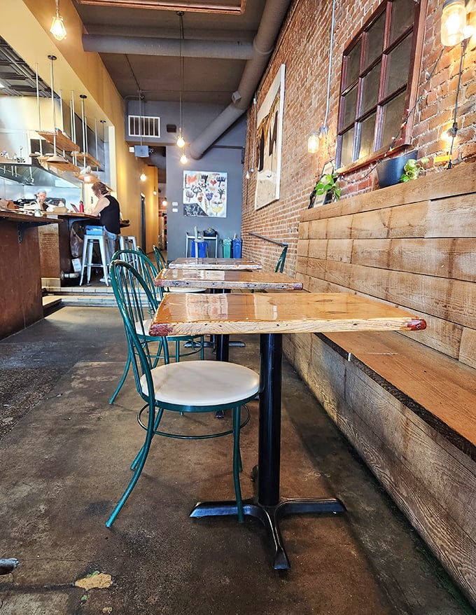 The dining room feels like the coolest friend's apartment&mdash;if that friend happened to be an exceptional cook. Industrial meets cozy in perfect harmony.