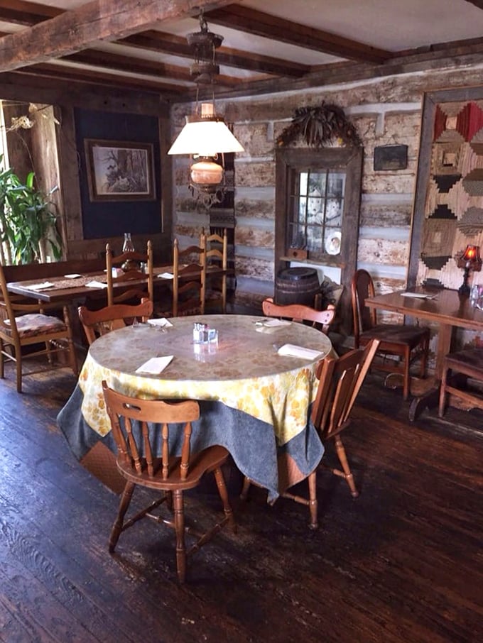 Dining rooms don't get more authentic than this&mdash;exposed beams, log walls, and tablecloths that would make your grandmother nod in approval.