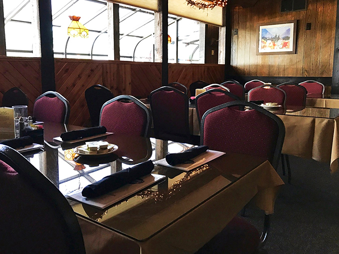 Tables set with care in a dining room where memories are made between bites of exceptional beef and sips of well-paired wine.