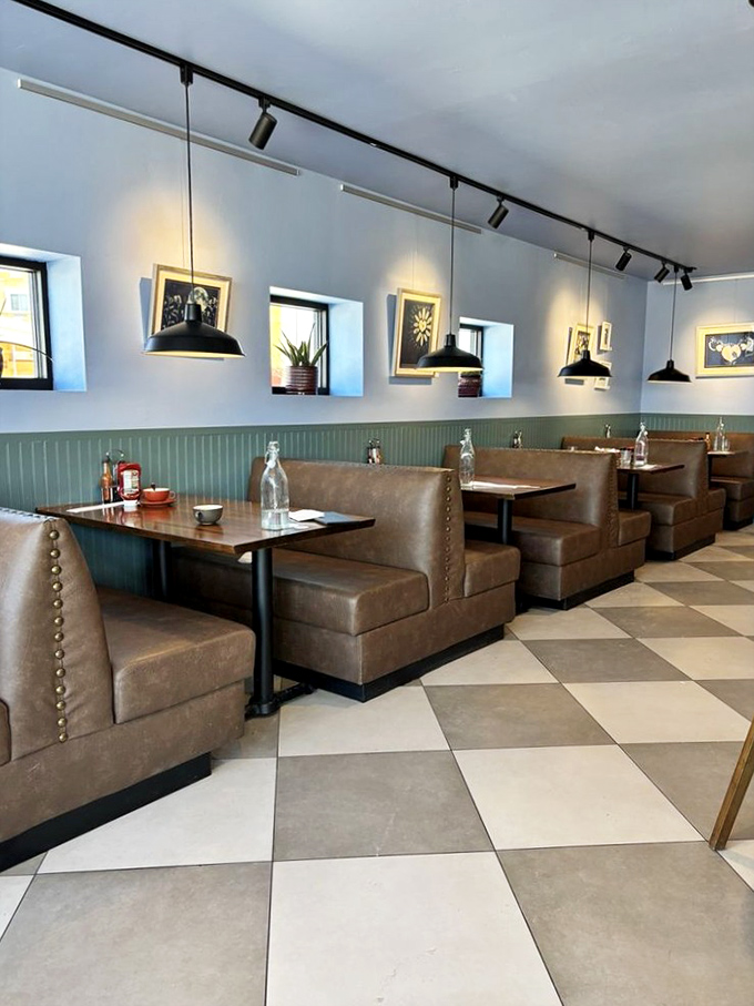 The dining room's mid-century modern meets diner aesthetic creates the perfect backdrop for both first dates and solving the Sunday crossword.