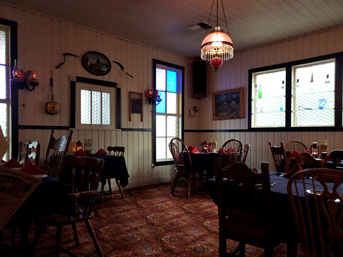 Vintage chandeliers cast a warm glow over wooden tables where countless "best steaks I've ever had" declarations have been uttered.