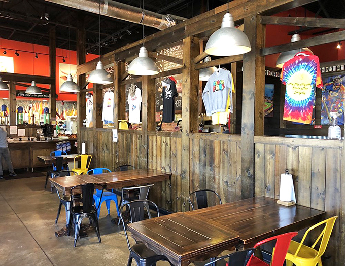 Rustic meets industrial in a space where tie-dye T-shirts hang like fine art. Even the chairs are color-coordinated with the BBQ experience.