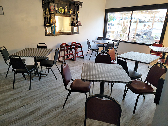 The dining room's minimalist charm lets you focus on what matters &ndash; that incredible chicken waiting just steps away.