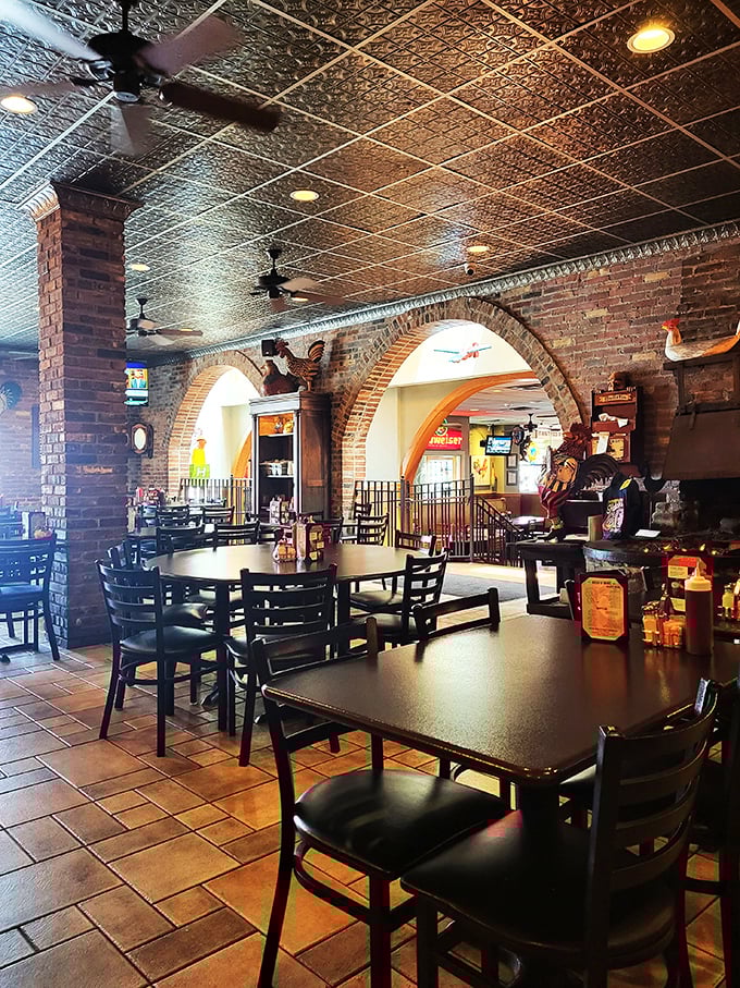 Brick arches and vintage ceilings create the perfect backdrop for chicken-induced happiness. Architecture that hugs you while you eat.