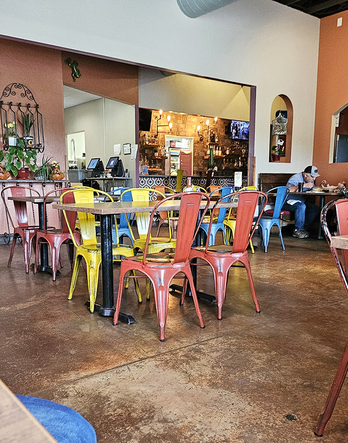 The dining room's vibrant chairs aren't just furniture&mdash;they're a mood-lifting color therapy session that comes free with your meal.