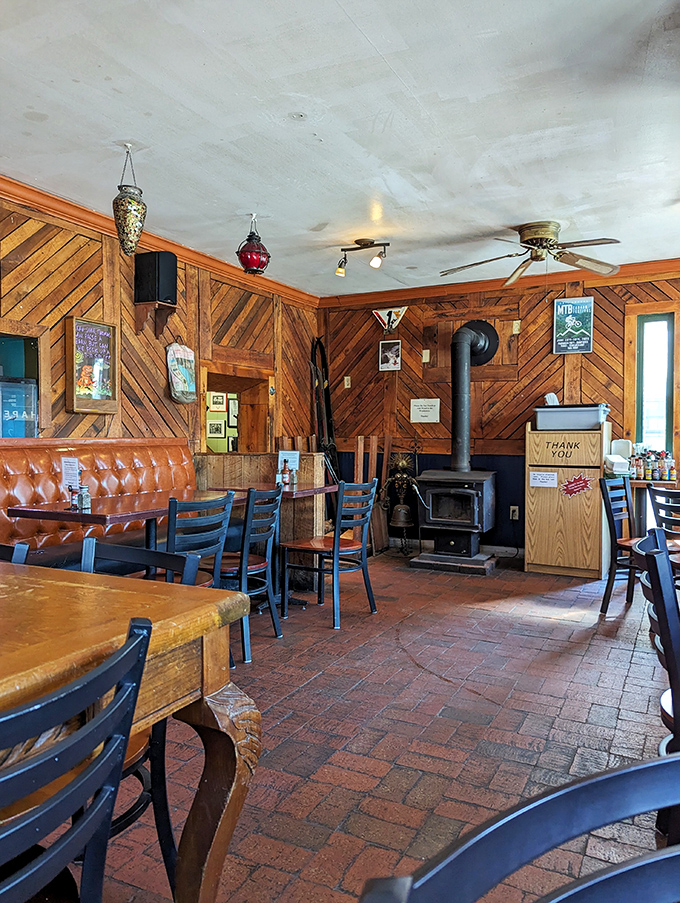 The wood stove in the corner isn't just for show&mdash;it's the soul of this cozy space where hikers, bikers, and food lovers gather year-round.