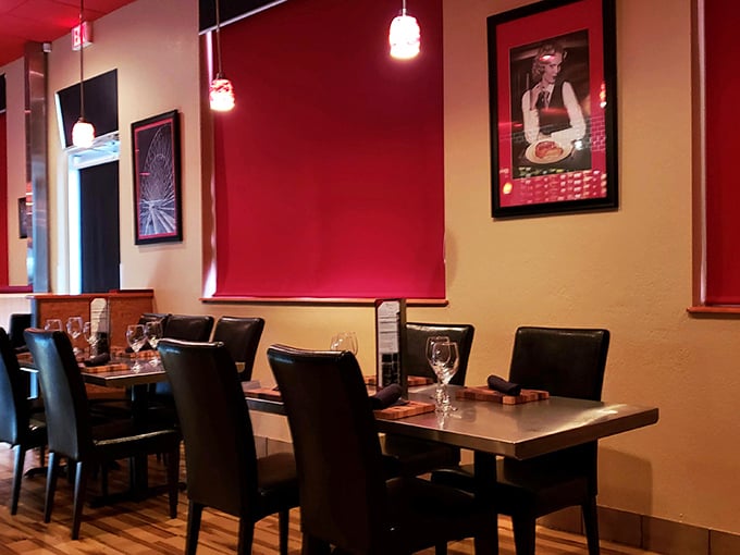 Red walls, woodgrain floors, and carefully arranged tables create the perfect stage for meat-based magic to happen. The lighting says, "You look fabulous tonight."