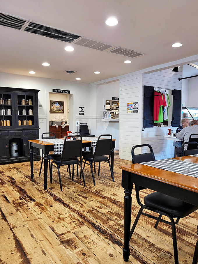 A dining room that whispers "stay awhile" with its farmhouse-modern charm and tables spaced for conversation, not eavesdropping.