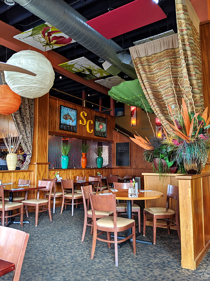 Paper lanterns, colorful bottles, and warm wood create the perfect backdrop for memories. This isn't decoration&mdash;it's storytelling through design.