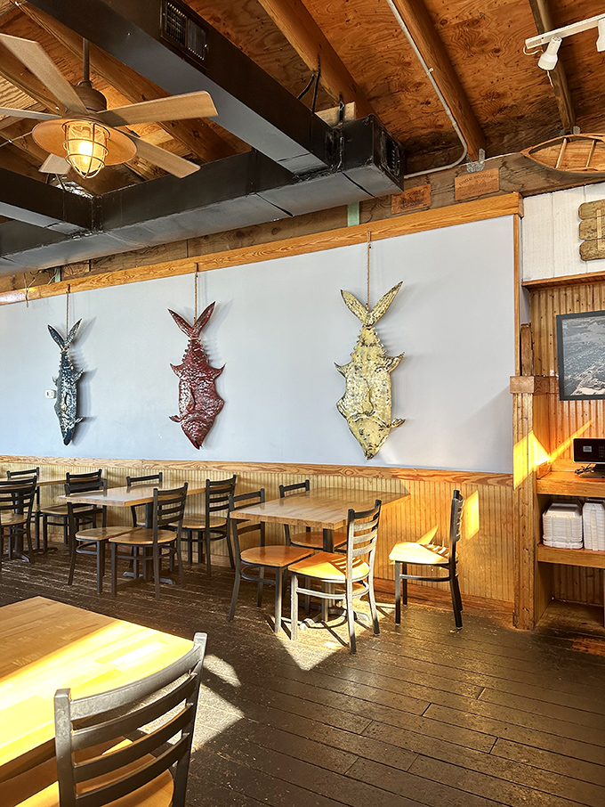 Sunlight streams through windows onto wooden tables while fish mounts stand guard&mdash;this isn't just d&eacute;cor, it's a maritime museum where you can eat.