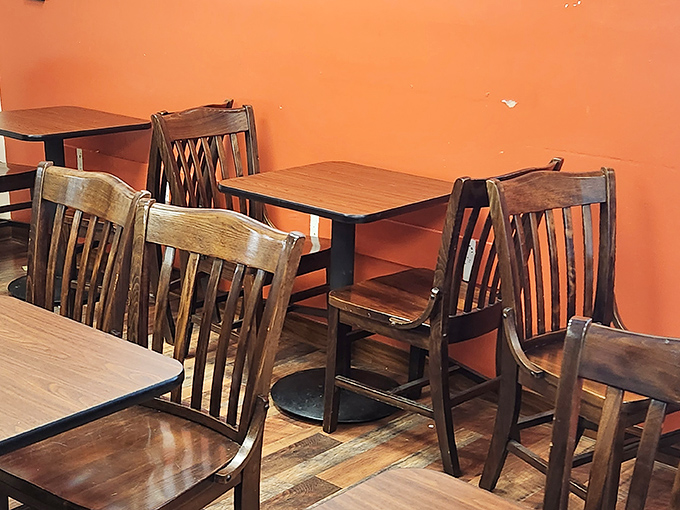 Simple wooden chairs and tables that have hosted thousands of satisfied sighs from customers experiencing sandwich euphoria.