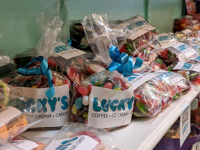 Custom candy bags waiting to find their forever homes. These aren't just sweets—they're portable happiness in perfectly tied packages.