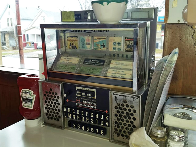 This vintage jukebox doesn't just play songs; it's a time portal to when music came with mechanical magic and the satisfying click of selection buttons.
