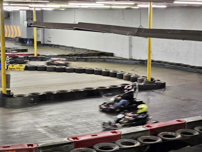 Where rubber meets road and Sunday drivers become weekend warriors. That tire barrier isn't just protection&mdash;it's motivation to stay on course.