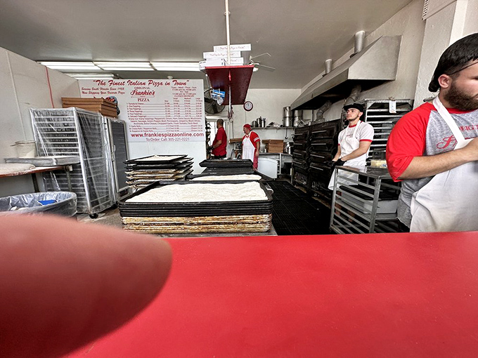 The kitchen at Frankie's&mdash;where magic happens without fancy equipment or celebrity chef egos. Just decades of pizza wisdom.
