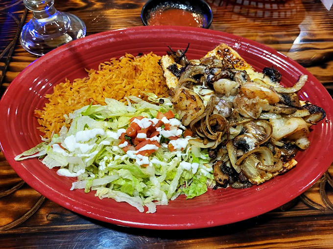 Sizzling fajita platters announce themselves before they even arrive. The char on those onions tells stories only your taste buds need to hear.