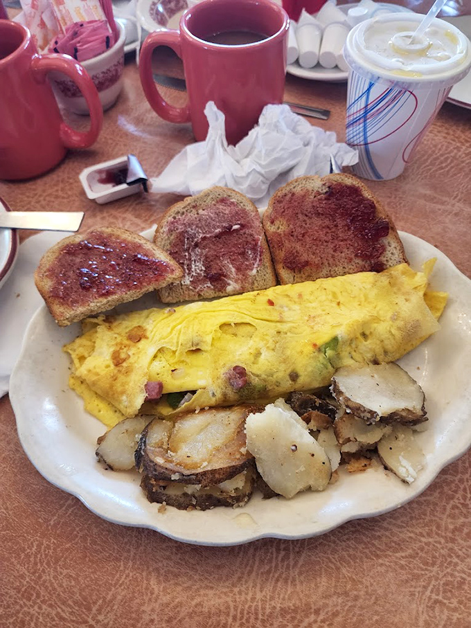 An omelet that's clearly been to college&mdash;it's well-rounded, full of potential, and comes with perfectly crisped home fries that deserve their own spotlight.