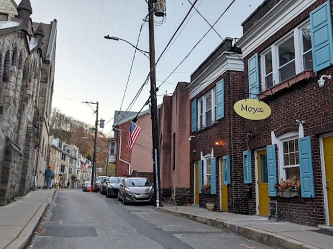 Moya's unassuming brick exterior with those distinctive blue shutters is the culinary equivalent of a poker player with a royal flush—no need to show off.