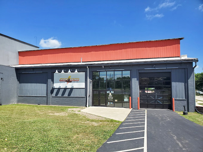 The red and gray exterior might not scream "speed sanctuary," but inside awaits the cure for your need-for-speed fever.