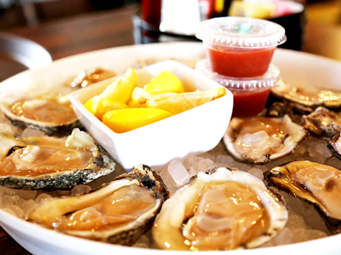 Fresh oysters on the half shell&mdash;nature's perfect appetizer. That little cup of cocktail sauce is standing by, ready for its supporting role in this briny drama.