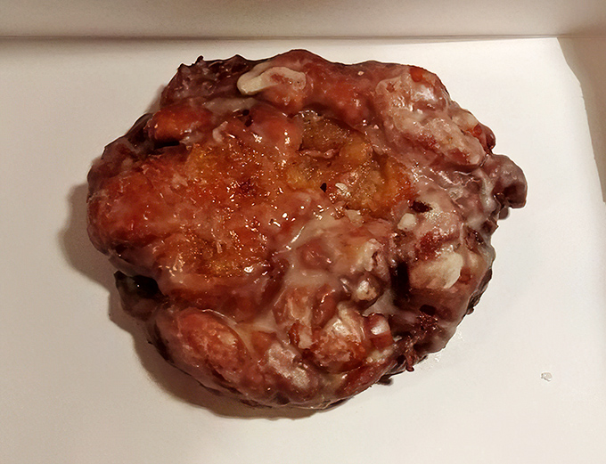 Not all heroes wear capes&mdash;some wear cinnamon and glaze. This fritter has more curves than a mountain highway.