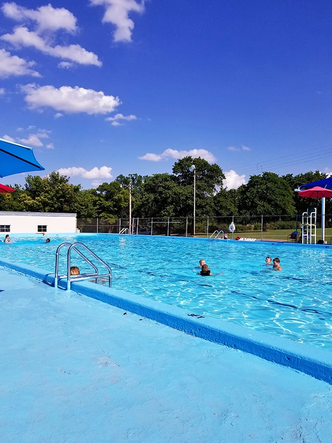 Nothing says "Oklahoma summer" quite like a community pool where memories are made one cannonball at a time.