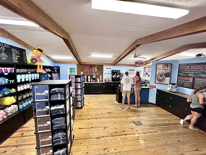 Rustic wooden beams and coastal blue walls create the perfect backdrop for the serious business of donut selection.