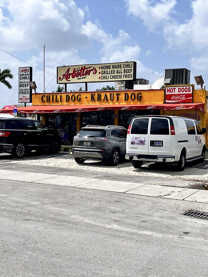 Arbetter's bright yellow building with bold red awning stands as a colorful monument to Miami's enduring love affair with the perfect chili dog.