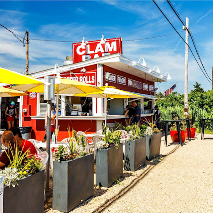 Clam Bar: "The cheerful red stand with 'CLAM BAR' practically shouts summer. One bite of their lobster roll and suddenly it's the best day of your vacation."
