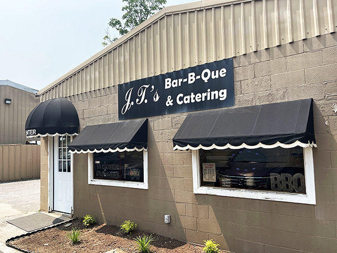 J.T.'s modest storefront with black awnings&mdash;where barbecue dreams come true without any unnecessary fuss or frills.