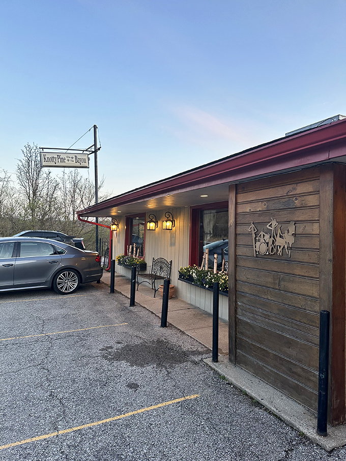 Knotty Pine's rustic wooden exterior promises Cajun secrets inside. Like finding Louisiana hiding in Kentucky's woods.