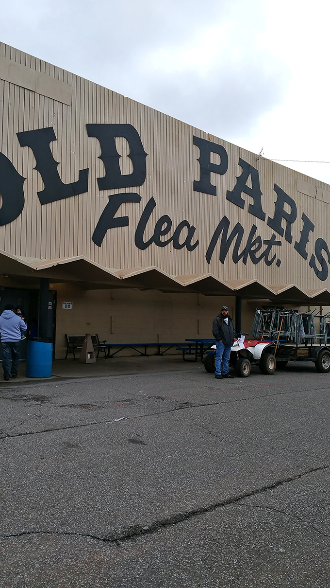 Old Paris Flea Market's vintage sign promises adventure. The kind of place where time slows down and discoveries speed up.