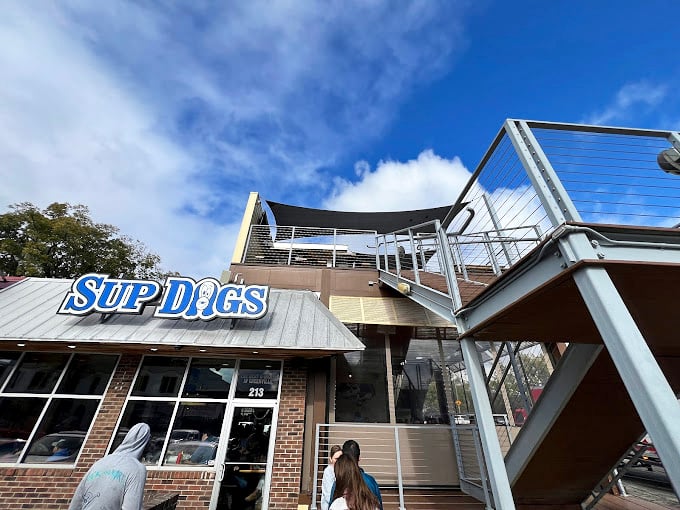 Sup Dogs' modern rooftop area proves that hot dog enjoyment can evolve while keeping its soul intact.