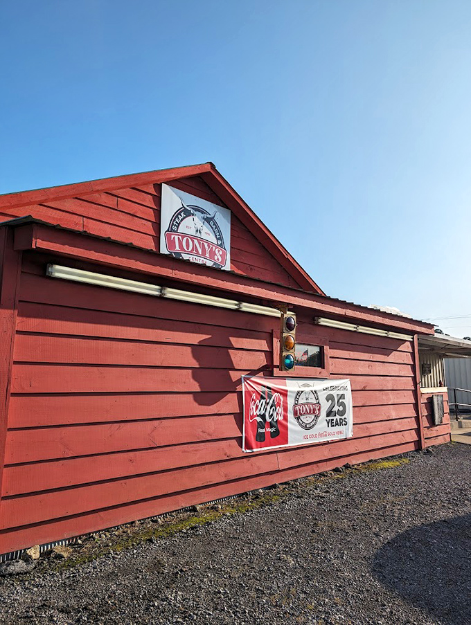 Tony's Steak Barn: Tony's vibrant red exterior stands out like a cardinal in winter &ndash; a bold promise of the unapologetically delicious experience waiting inside.