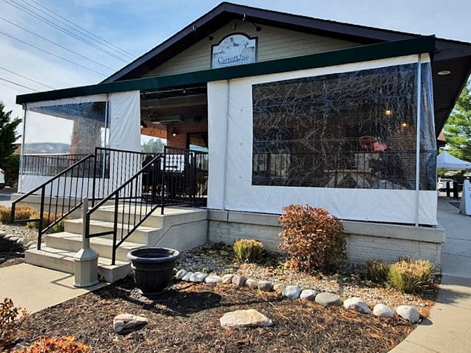 CarterQue BBQ: The clear weather barriers on that porch mean nothing comes between you and BBQ &ndash; not even Mother Nature herself.