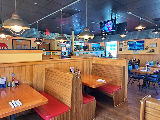 Classic booth seating inside CarterQue creates the perfect setting for the all-American ritual of getting sauce on your chin.