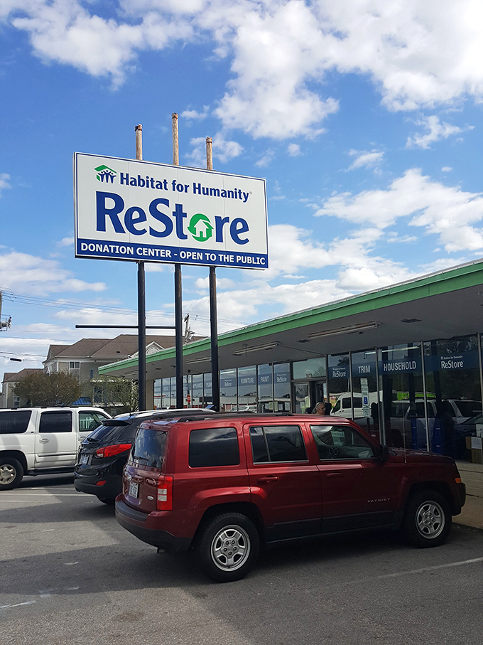 Under brilliant blue skies, ReStore's prominent signage guides bargain hunters to a wonderland of home goods and building materials.
