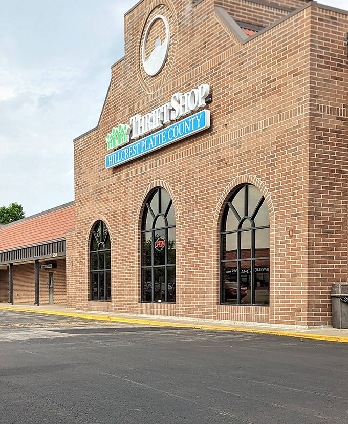 Those elegant arched windows frame a shopping experience that feels more like a carefully curated estate sale.