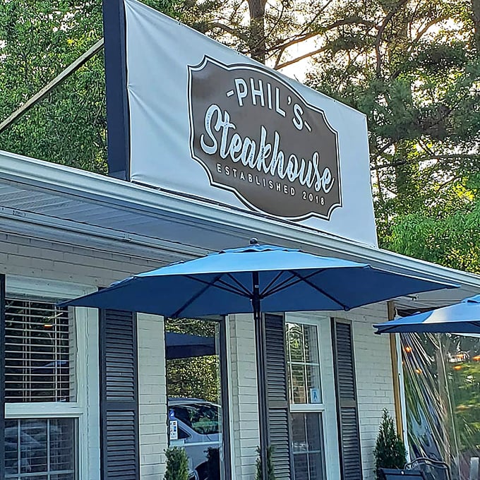 That simple blue and white sign at Phil's speaks volumes. In the world of steaks, sometimes the quietest places shout the loudest.